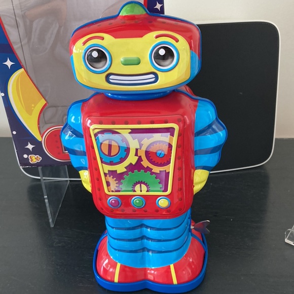 Schylling | Toys | Cosmo Wind Up Tin Robot | Poshmark